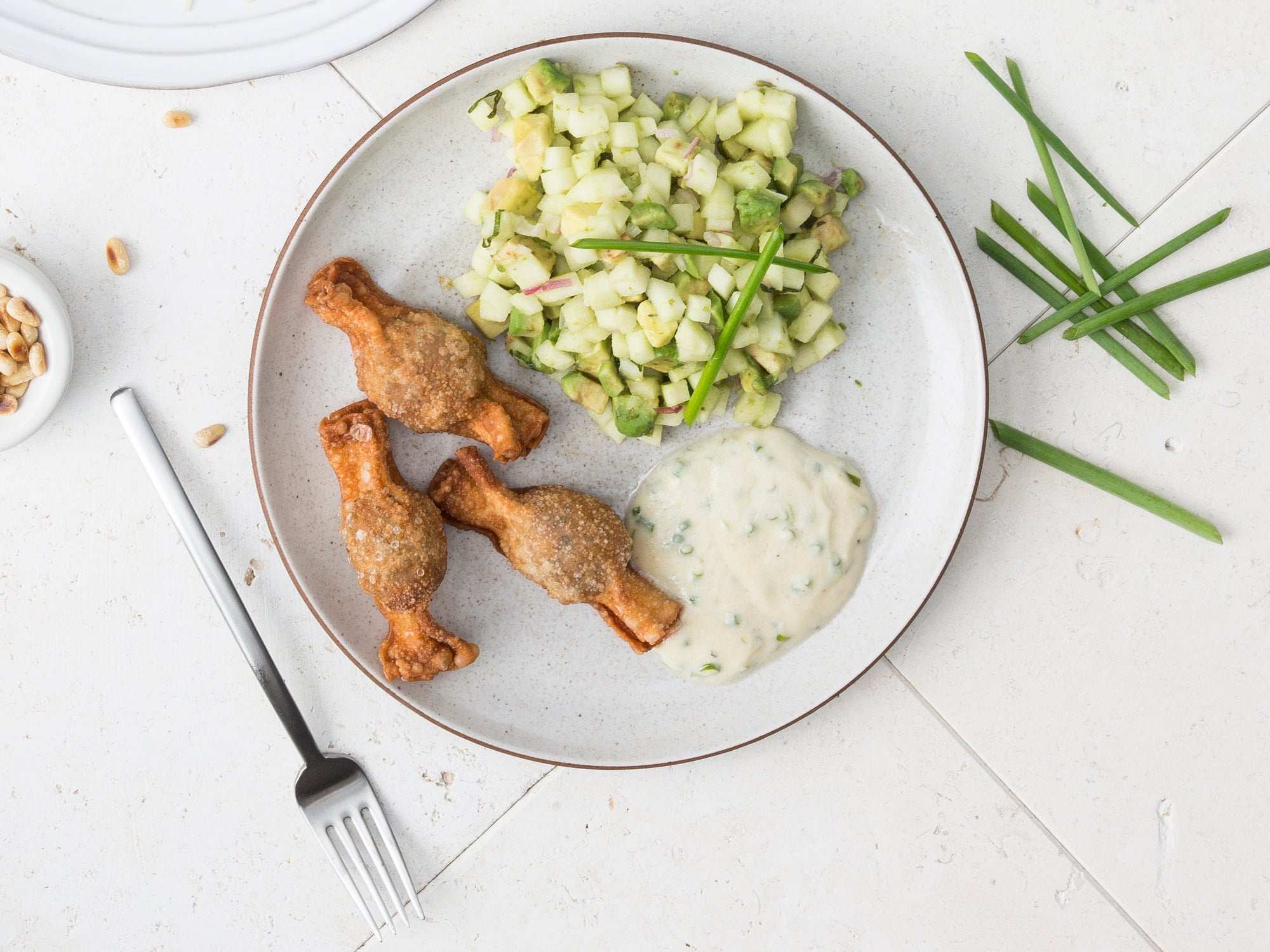 Avocado and Apple “Tartare” with Fried Walnut Dumplings and Chive Cream
