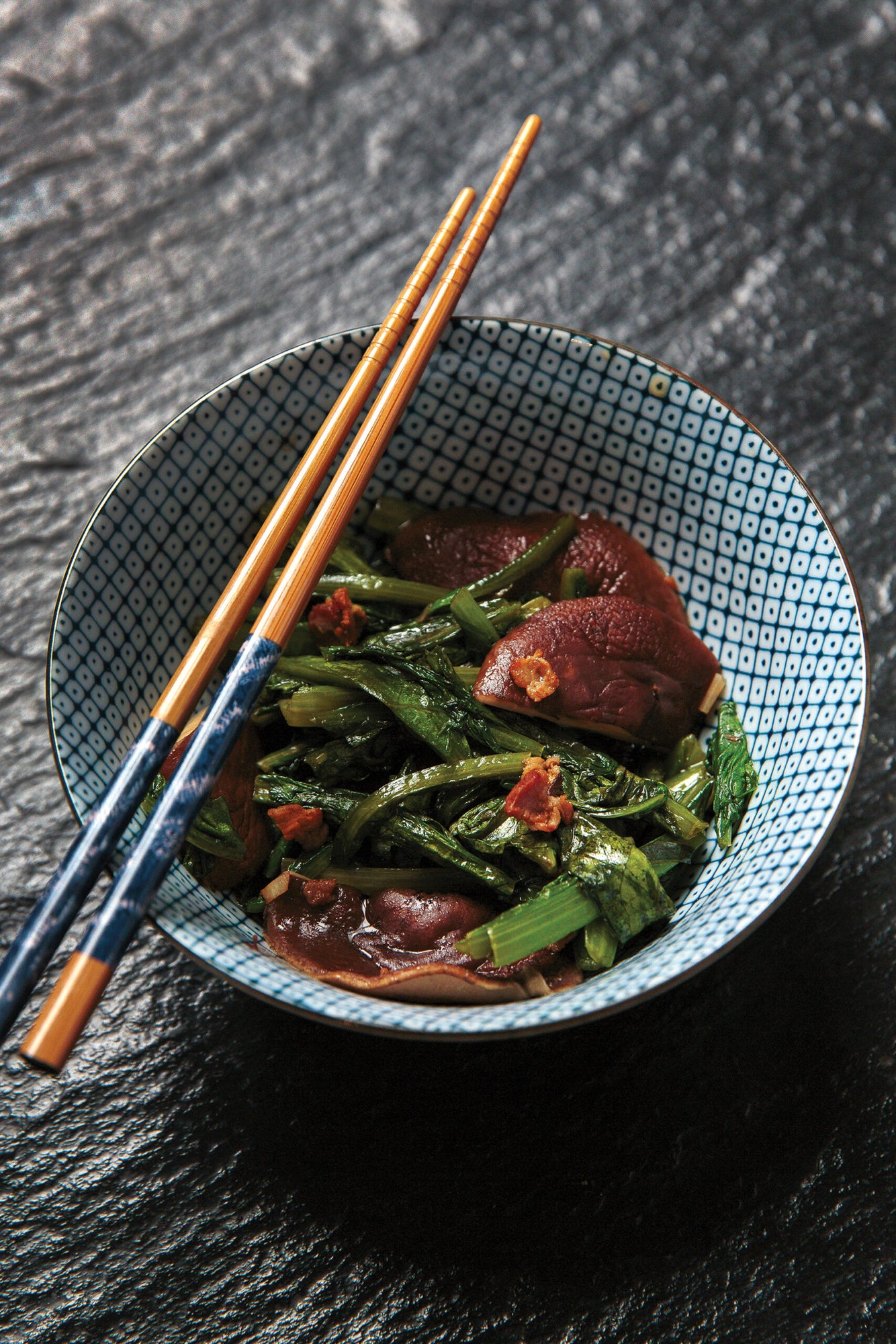Stir-Fried Celtuce Tops with Mushrooms (Xianggu Chao Wosun Ye)